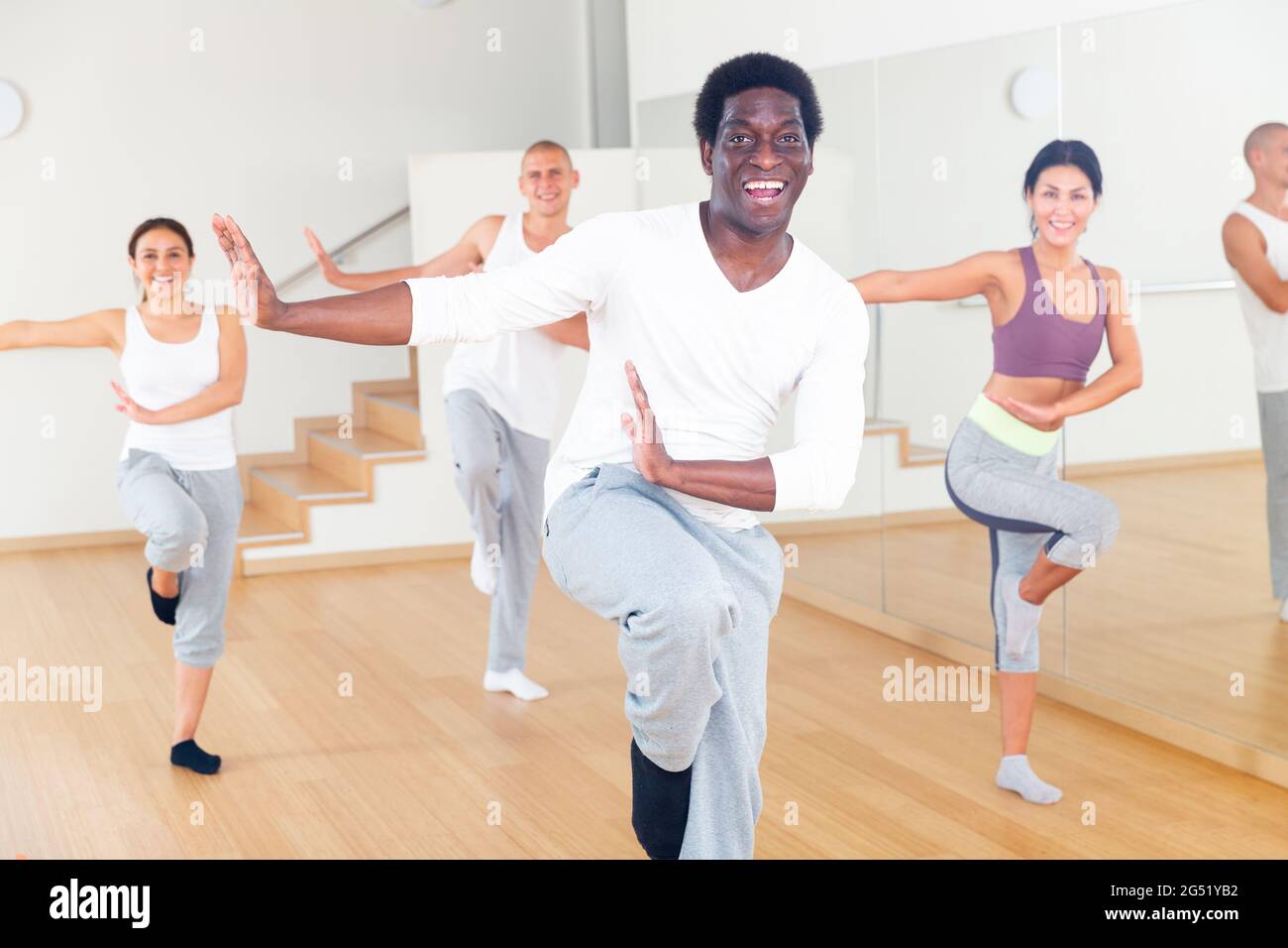 Cheerful african american man practicing vigorous dance movements Stock ...