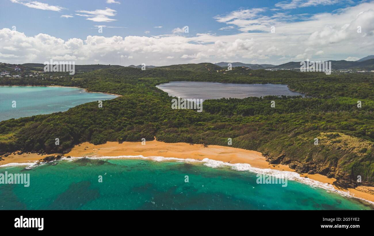 Arial view Play Colora and lagoon surrounded by jungle in tropical ...