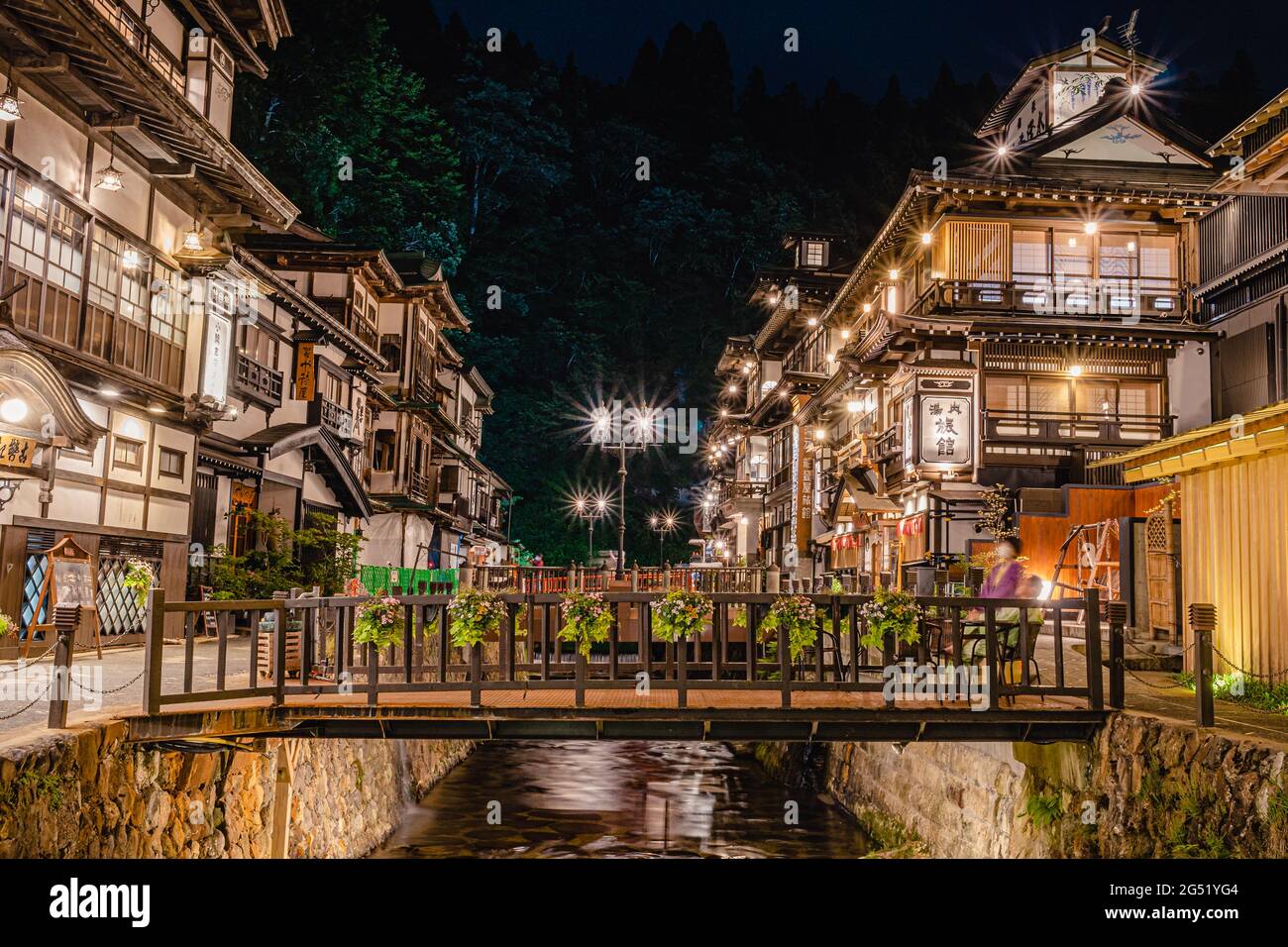 Famous Ginzan Onsen Street light up at night, hot spring town nestled in the mountains of ...