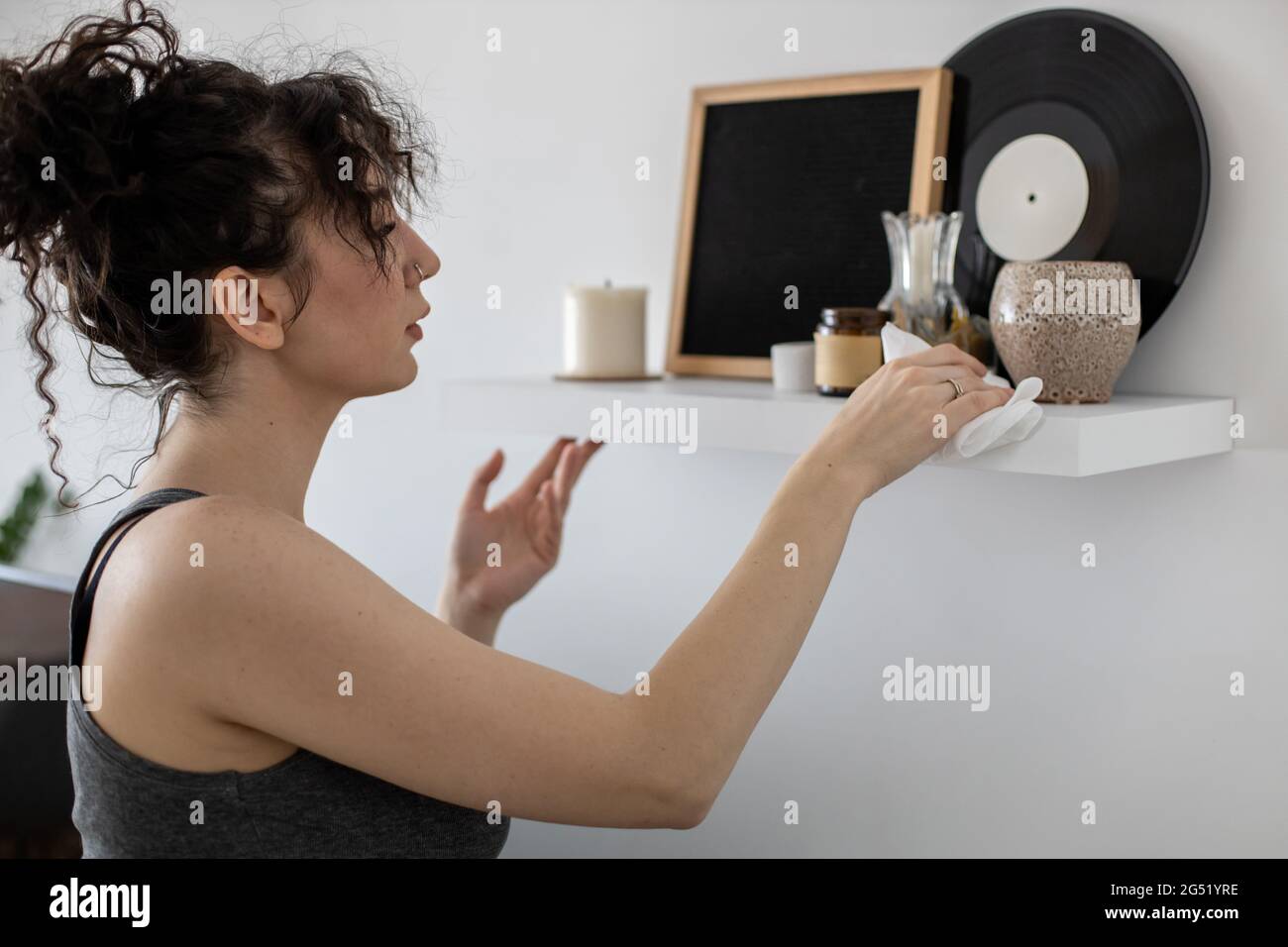 Wiping dust off hi-res stock photography and images - Alamy