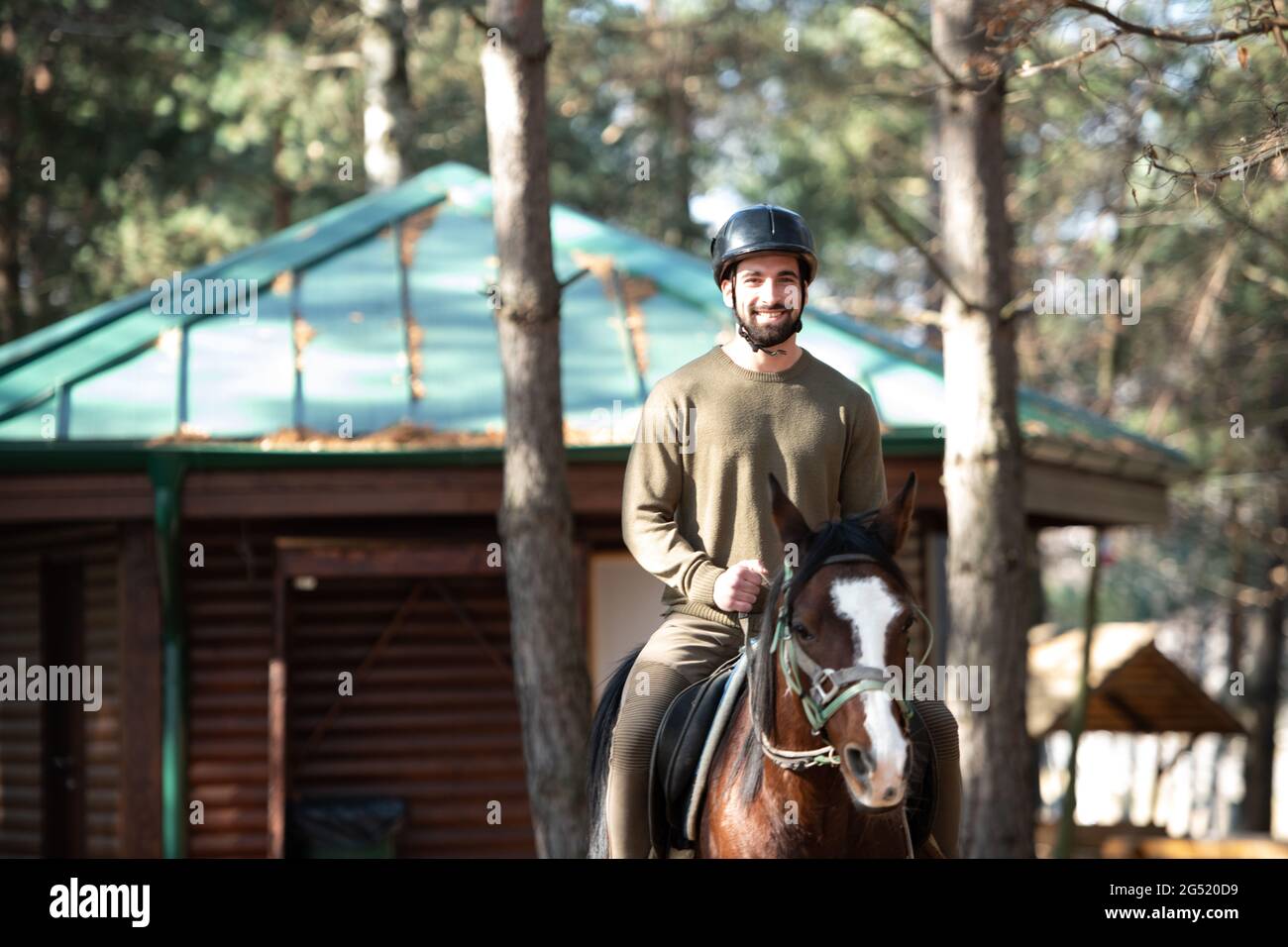 Young Man Rider With Her Horse Enjoying Good Mood in Evening Sunset ...
