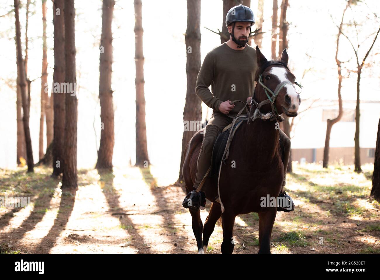 Young Man Rider With Her Horse Enjoying Good Mood in Evening Sunset ...