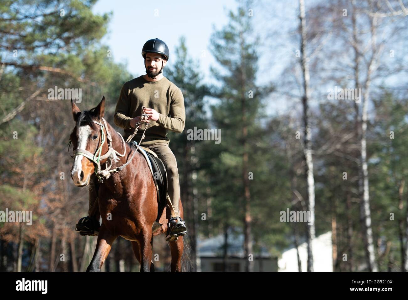 Young Man Rider With Her Horse Enjoying Good Mood in Evening Sunset ...