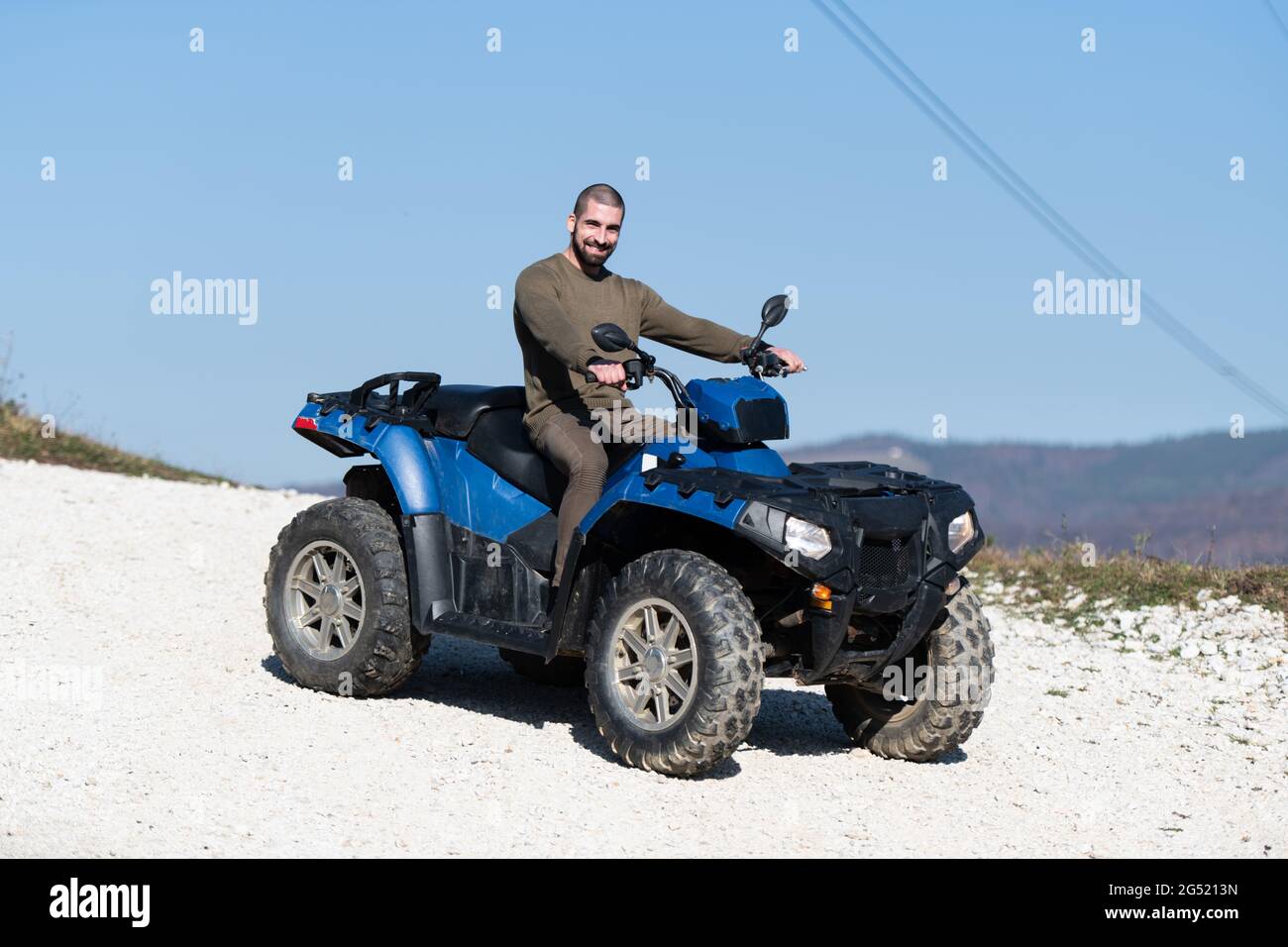 Young Man Driving Off Road Adventure With Happy and Smiling Stock Photo ...
