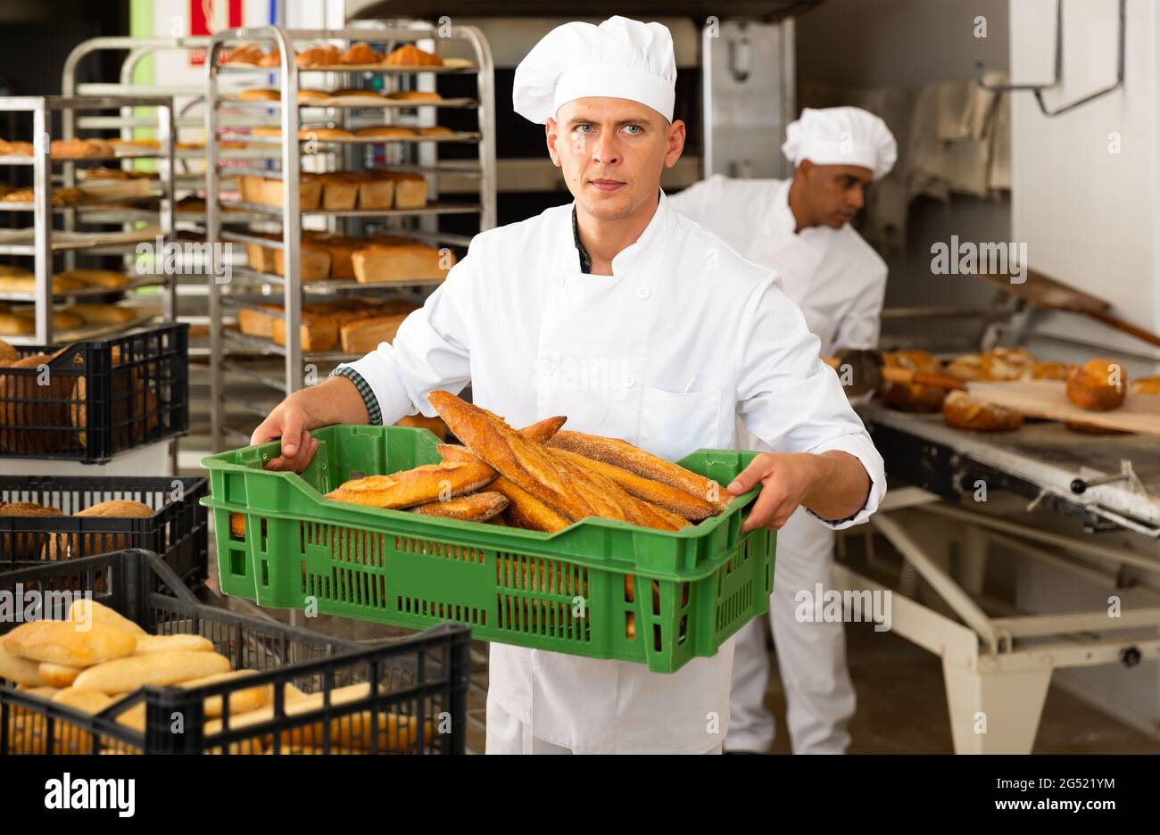 portrait of european male baker in bakery Stock Photo - Alamy