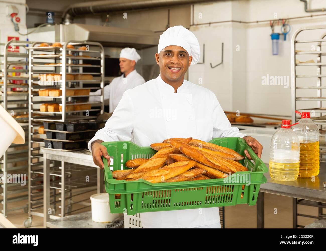 portrait of latino male baker in bakery Stock Photo - Alamy
