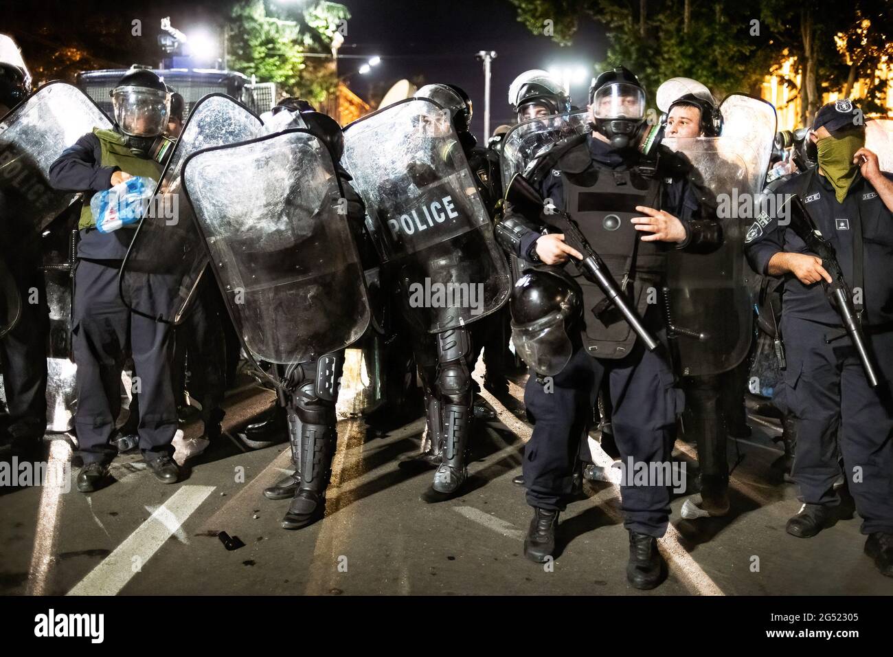 Riot police units mobilize on Rustaveli Avenue during the demonstration ...