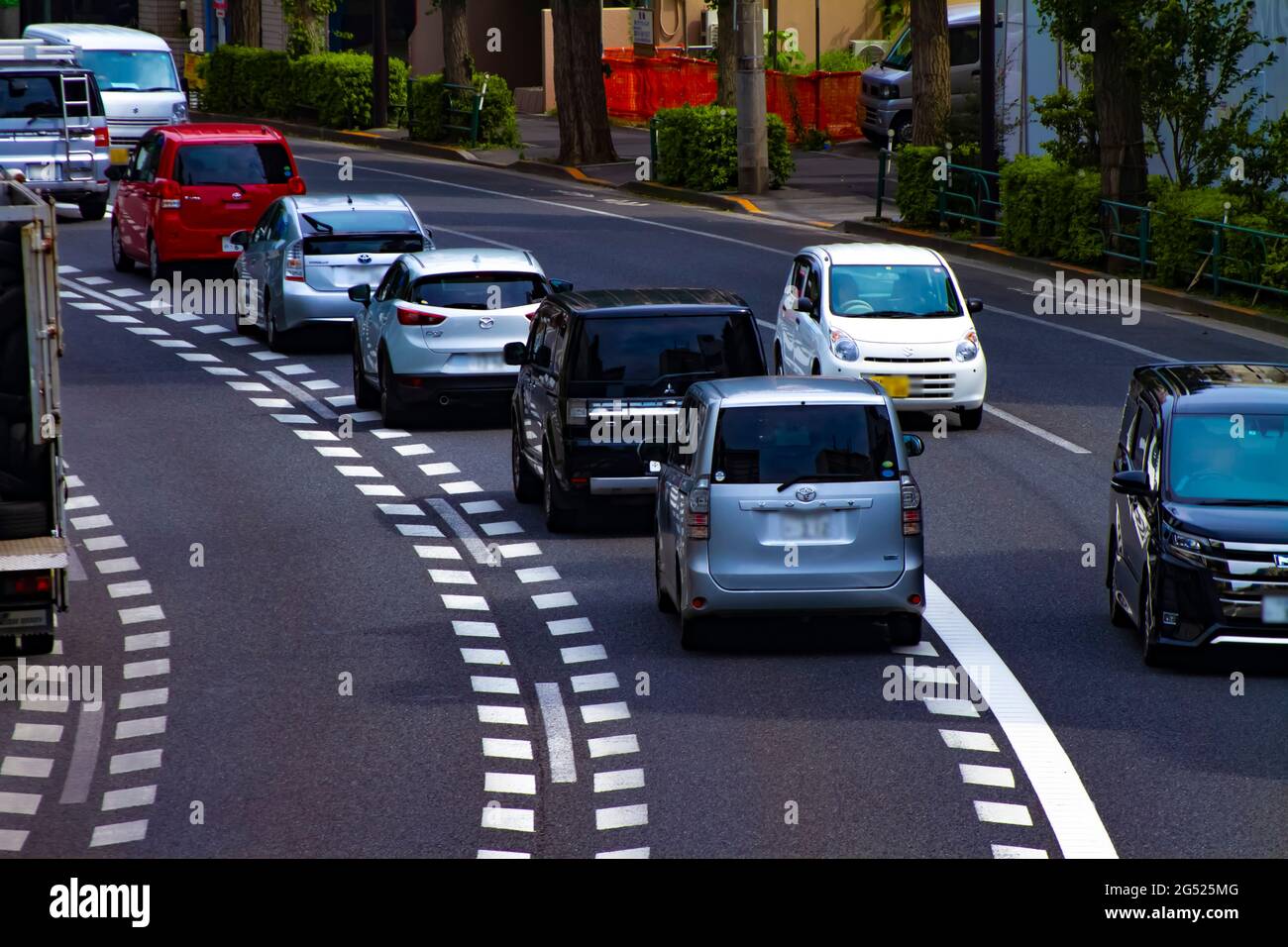 A downtown street at Oume avenue in Tokyo daytime long shot Stock Photo ...