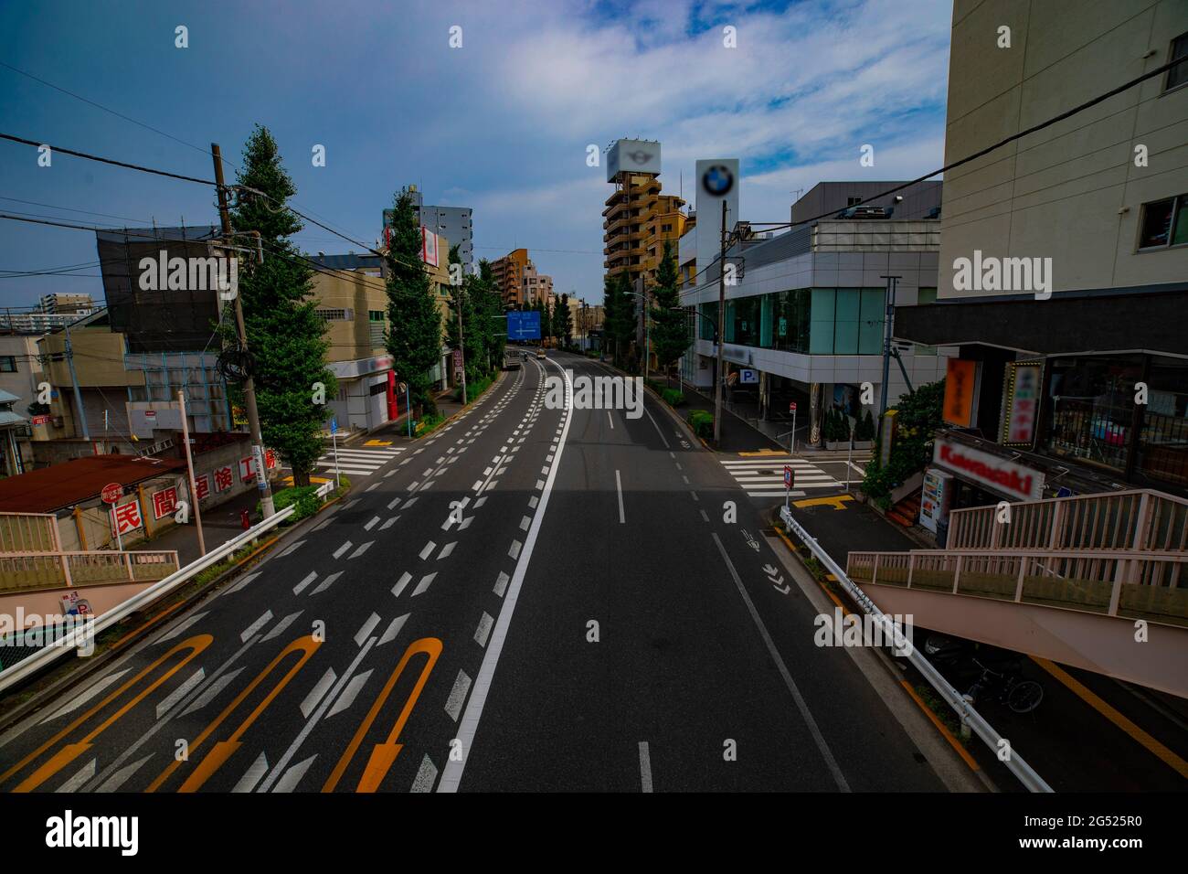 A downtown street at Oume avenue in Tokyo daytime wide shot Stock Photo ...