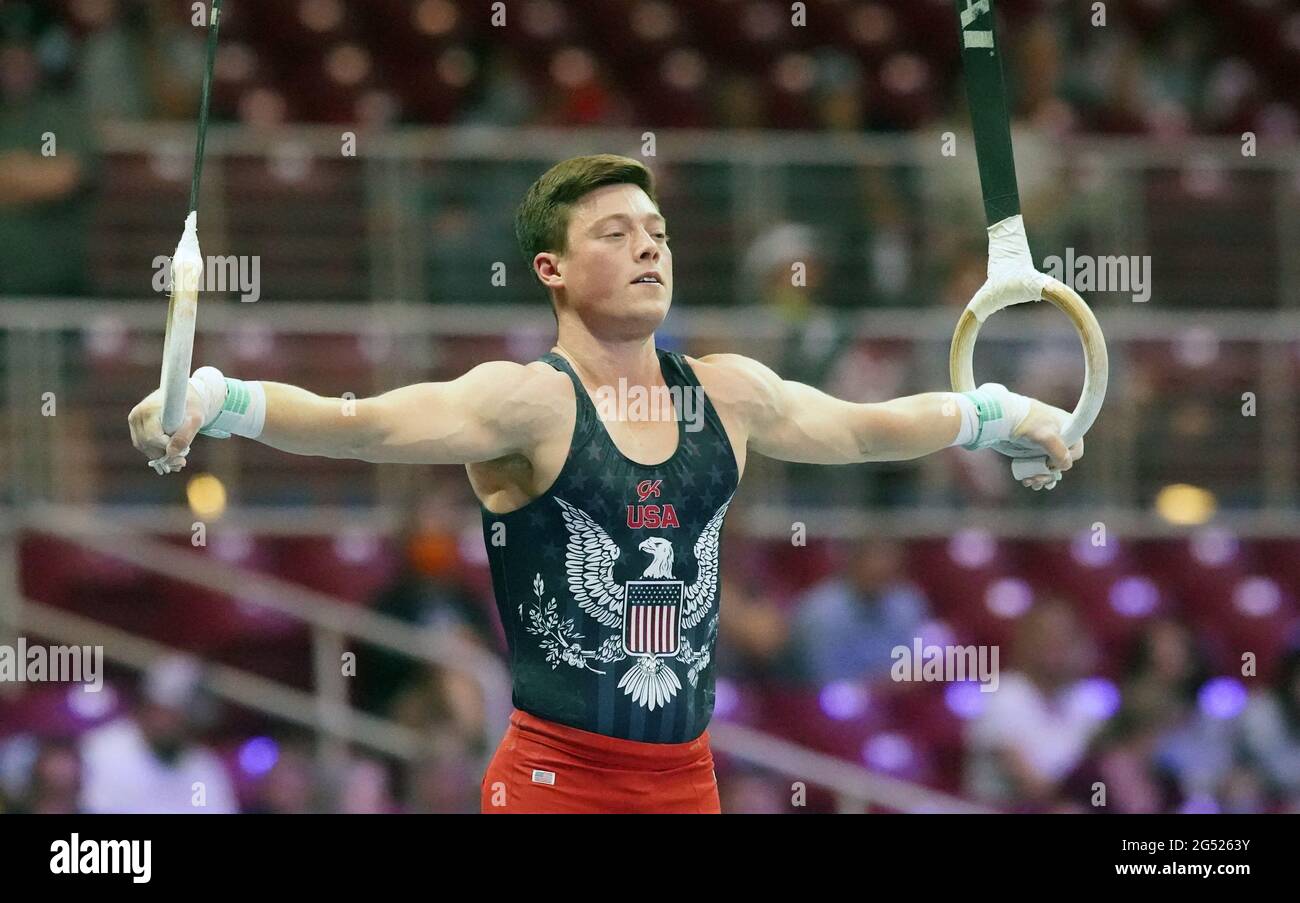 Alex Diab of the University of Illinois performs on the rings during ...