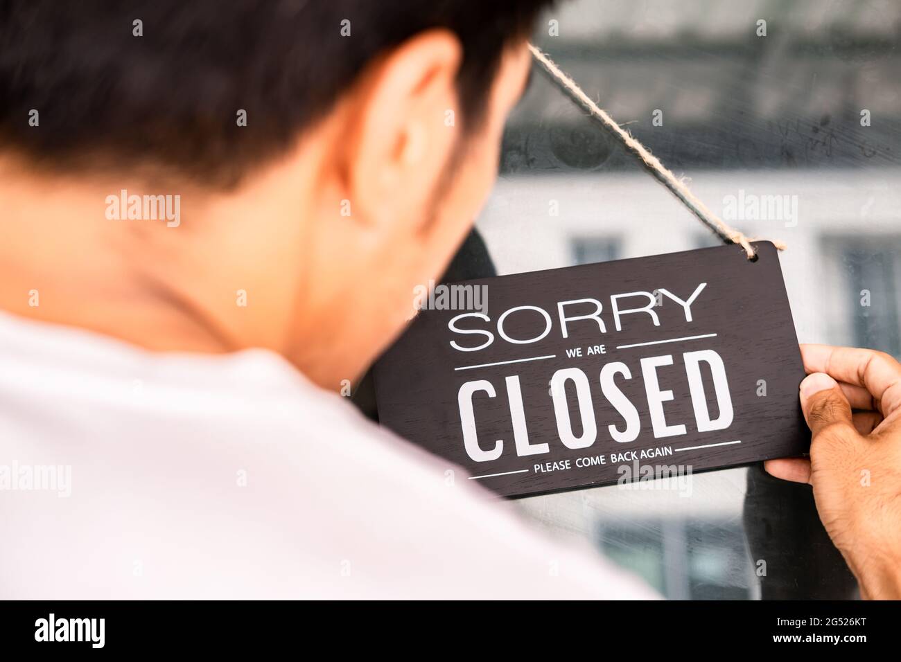 Asians with sign open and closed in restaurant for lockdown ideas ...