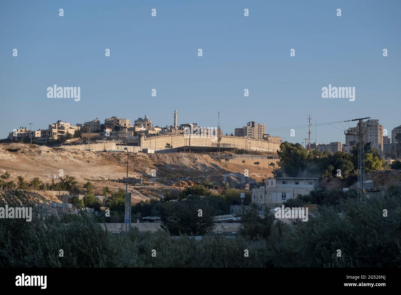 View of the Israeli West Bank separation barrier cutting through Abu ...