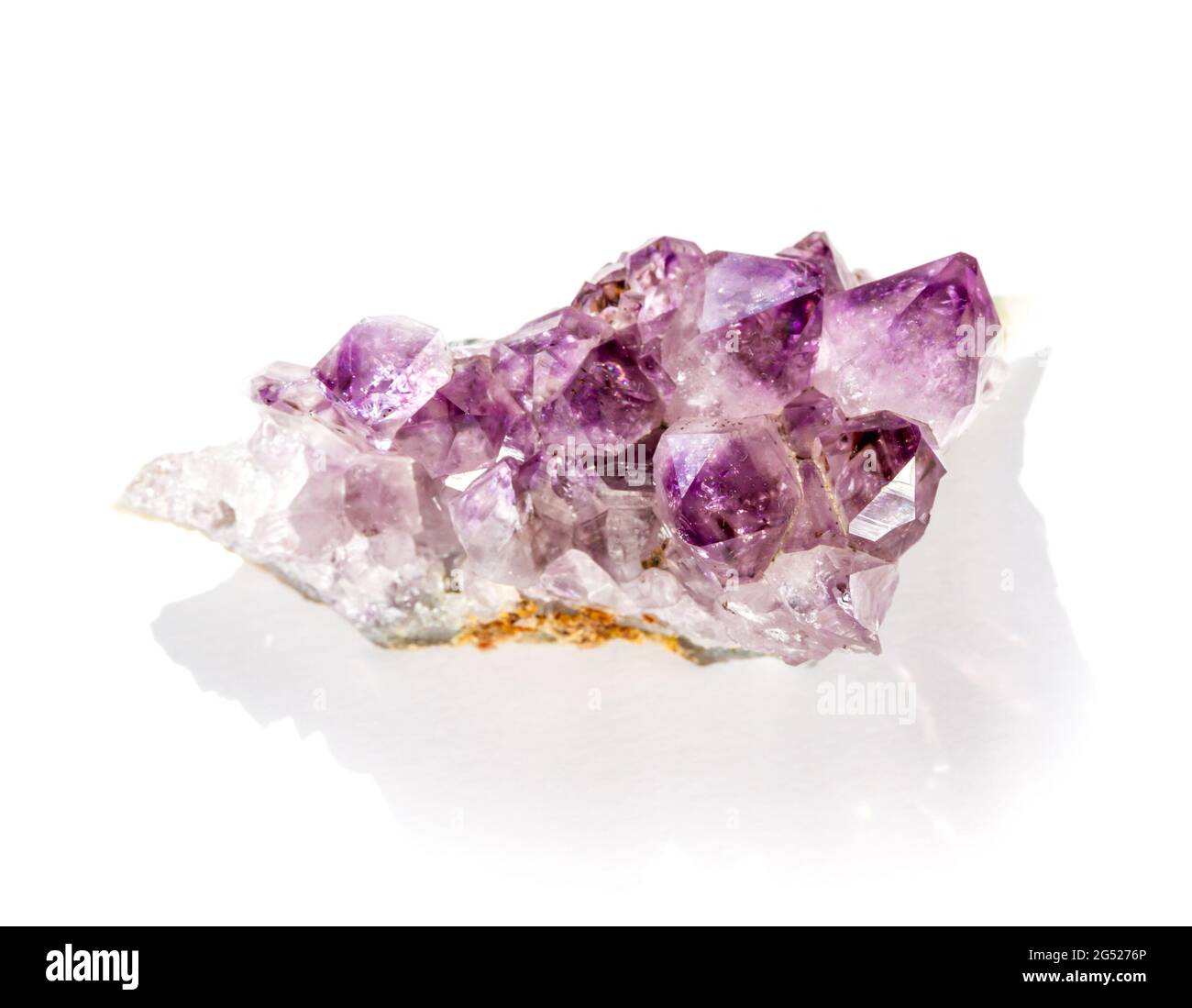 Amethyst gemstone isolated on a white background Stock Photo - Alamy