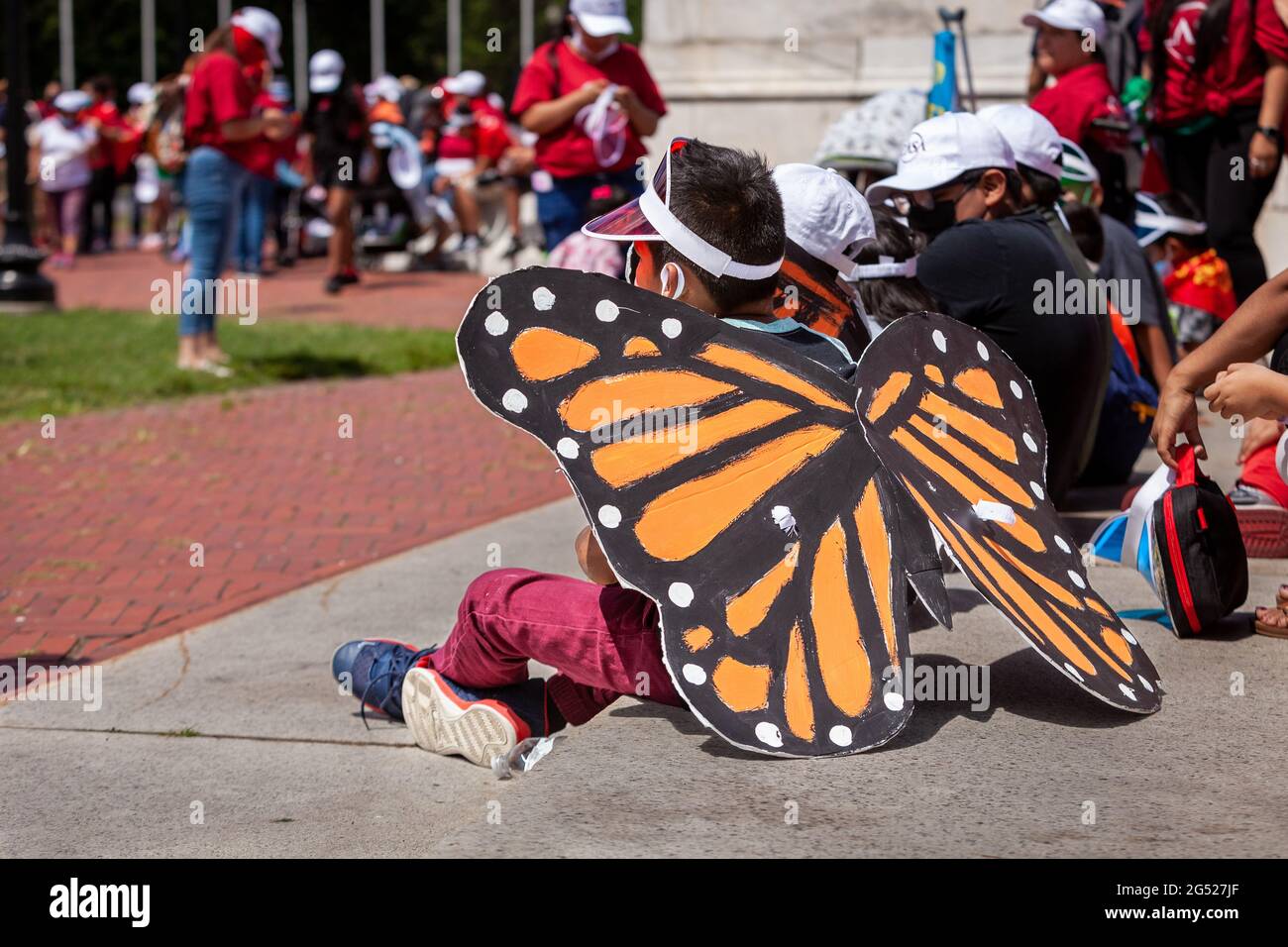 Washington, DC, USA, 24 June, 2021. Pictured: A boy wearing monarch ...