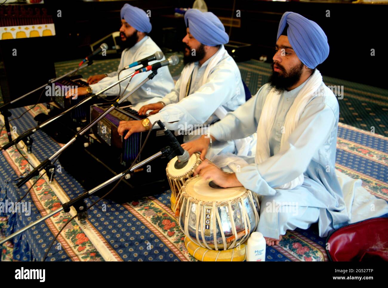 Rajis playing shabads from the Guru Granth Sahib in the gurdwara Sikh ...