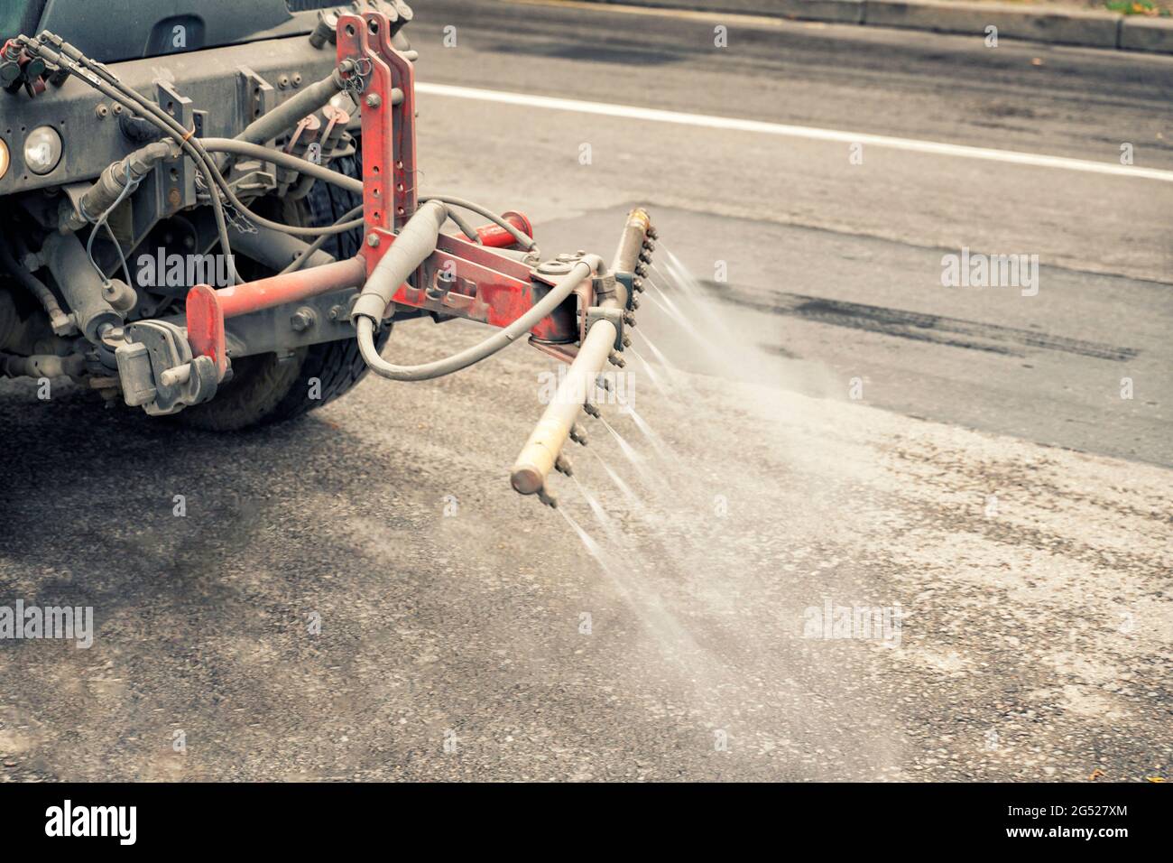 Truck cleaning watering road hi-res stock photography and images - Alamy