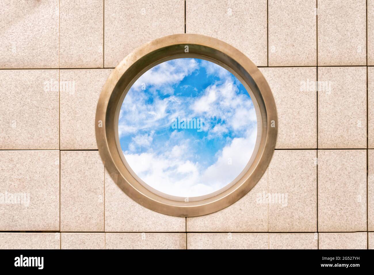 round window to the sky on an old tiled wall. hope concept Stock Photo ...