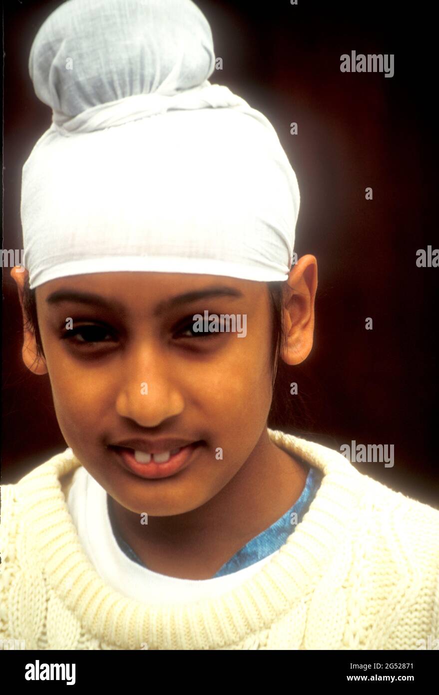 Sikh boy wears a patka or topknot Stock Photo - Alamy