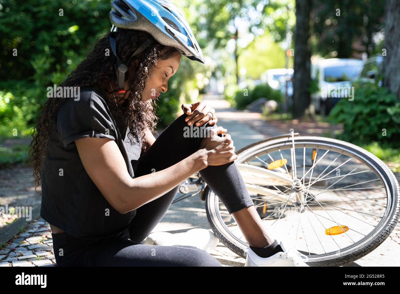 Cyclist Fell Down From Bike. Bicycle Injury Stock Photo - Alamy