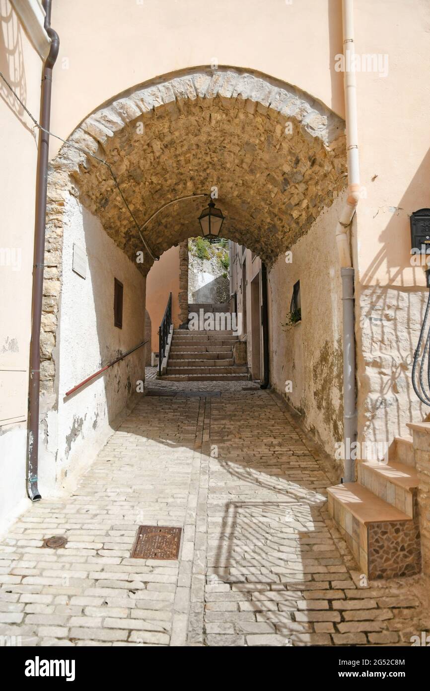 Candela, Italy, June 23, 2021. A small street between the old houses of ...