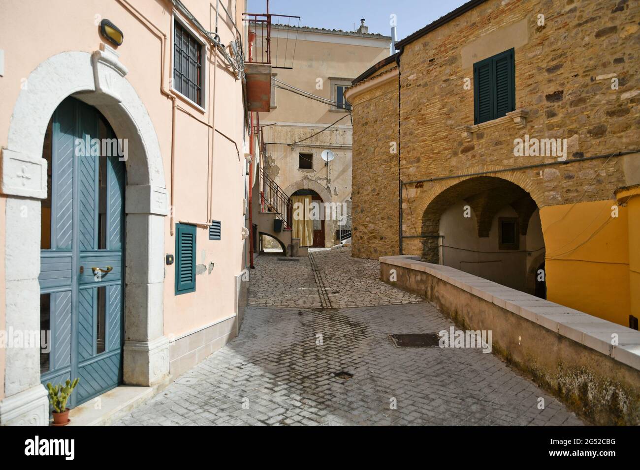 Candela, Italy, June 23, 2021. A small street between the old houses of ...