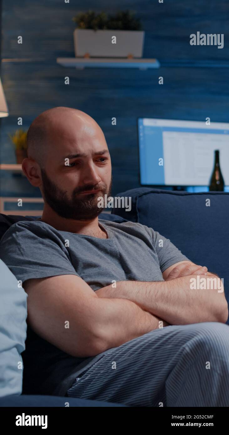 Stressed depressed traumatised, frustrated man looking in distance ...