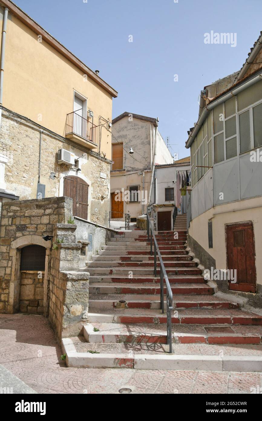 Candela, Italy, June 23, 2021. A small street between the old houses of ...