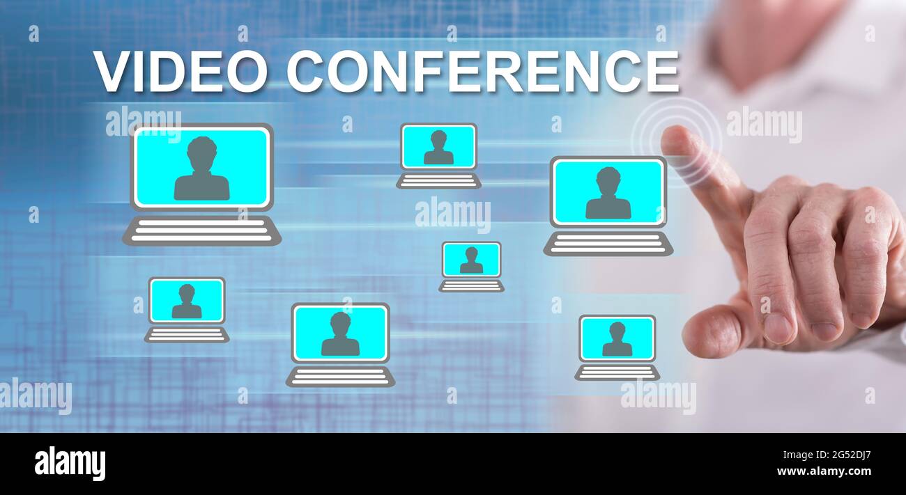 Man touching a video conference concept on a touch screen with his ...