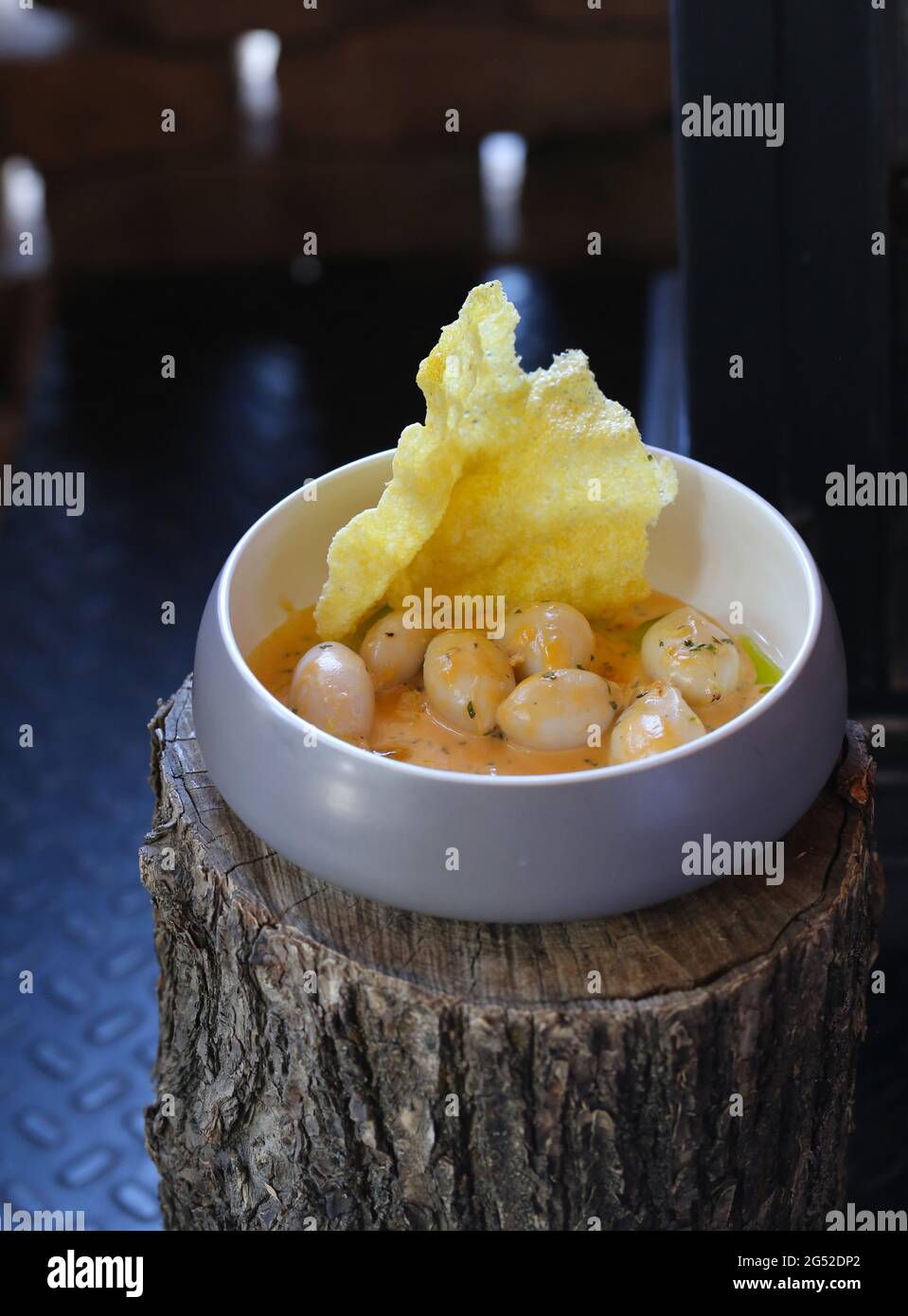 mini squid stuffed with creamy sauce Stock Photo - Alamy