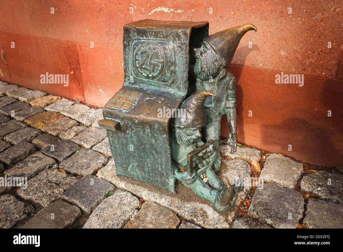 Wroclaw, Poland - June 21, 2019: Dwarf gnome and atm sculpture, symbol ...