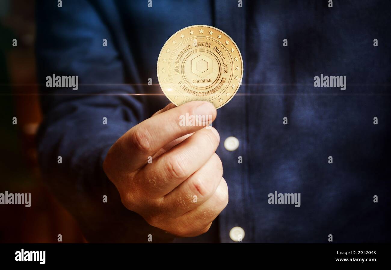 Chainlink link cryptocurrency symbol golden coin in hand abstract ...