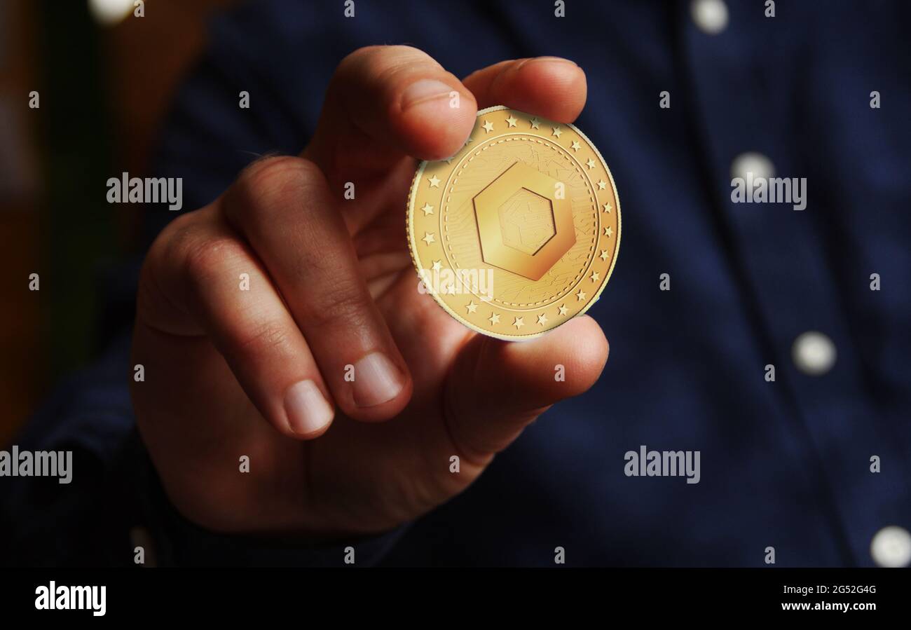 Chainlink link cryptocurrency symbol golden coin in hand abstract ...