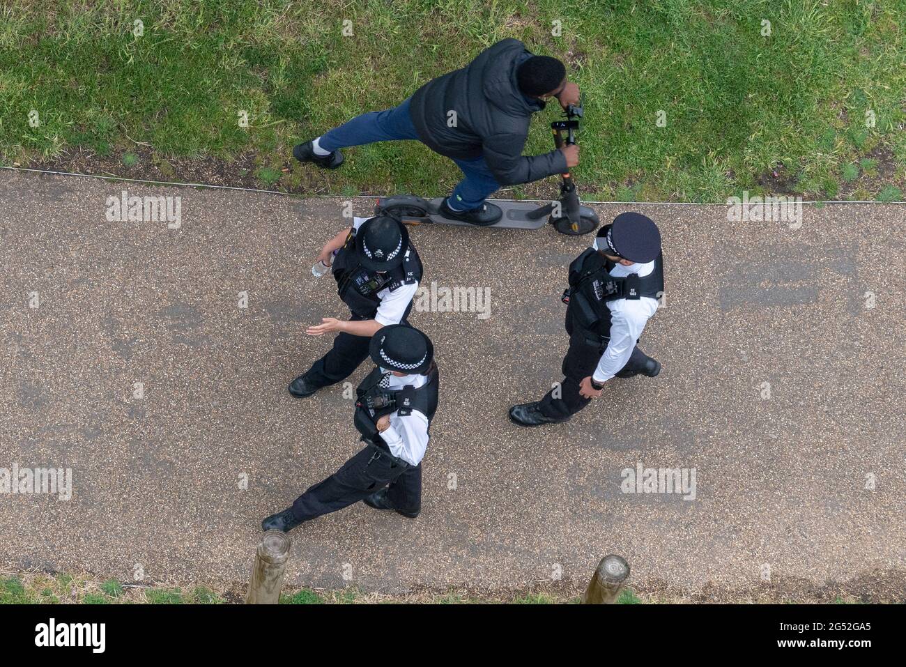 Community police and youths during patrols through a housing estate in ...