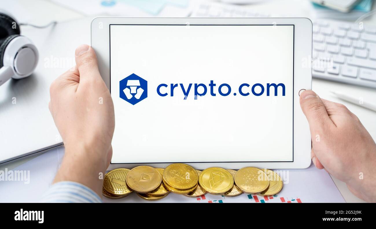 Russia Moscow 06.05.2021.Businessman with tablet.Logo of cryptocurrency ...