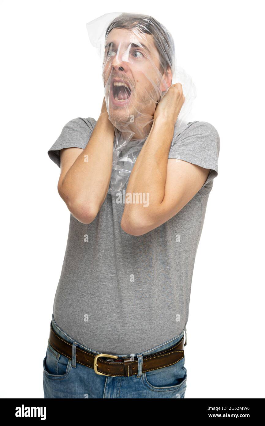 Young handsome tall slim white man with brown hair choking himself with ...