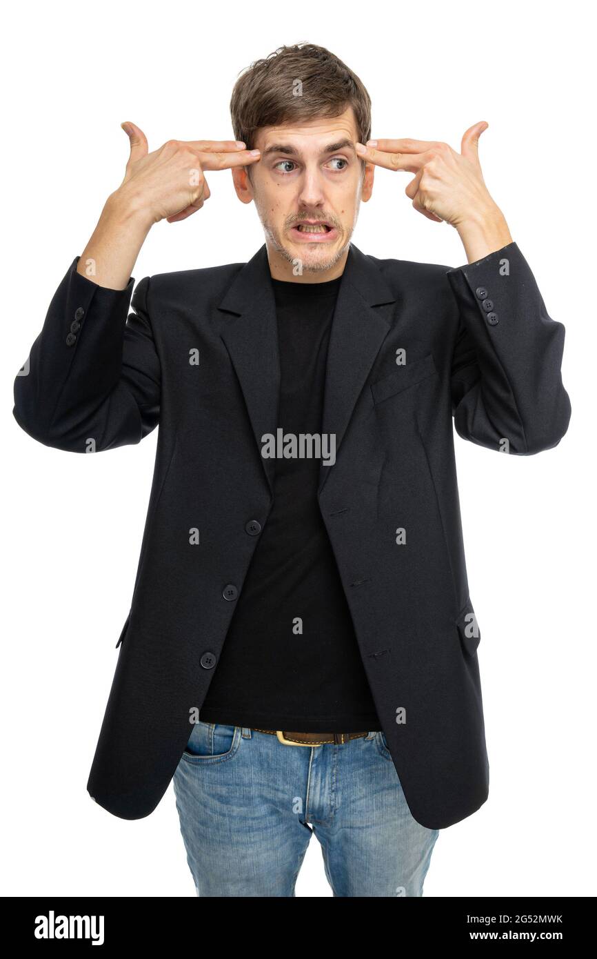 Young handsome tall slim white man with brown hair pointing at his head ...