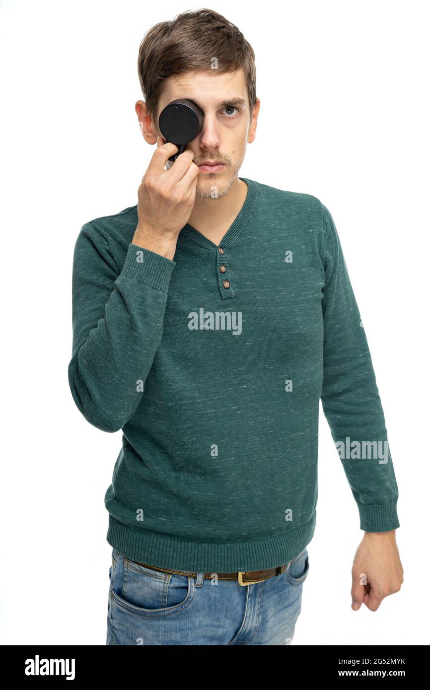 Young handsome tall slim white man with brown hair covering his eye ...