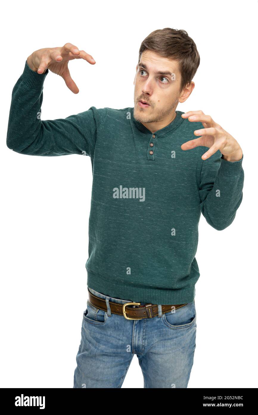 Young handsome tall slim white man with brown hair looks confused in ...