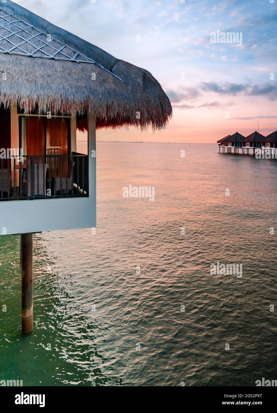 Overwater thatched bungalows Rooms in Malaysia. Huts standing on stilts ...