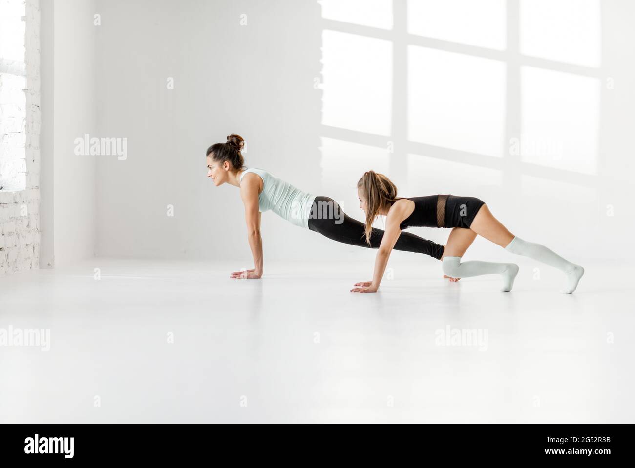 Woman with a little girl on rhythmic gymnastics training Stock Photo ...