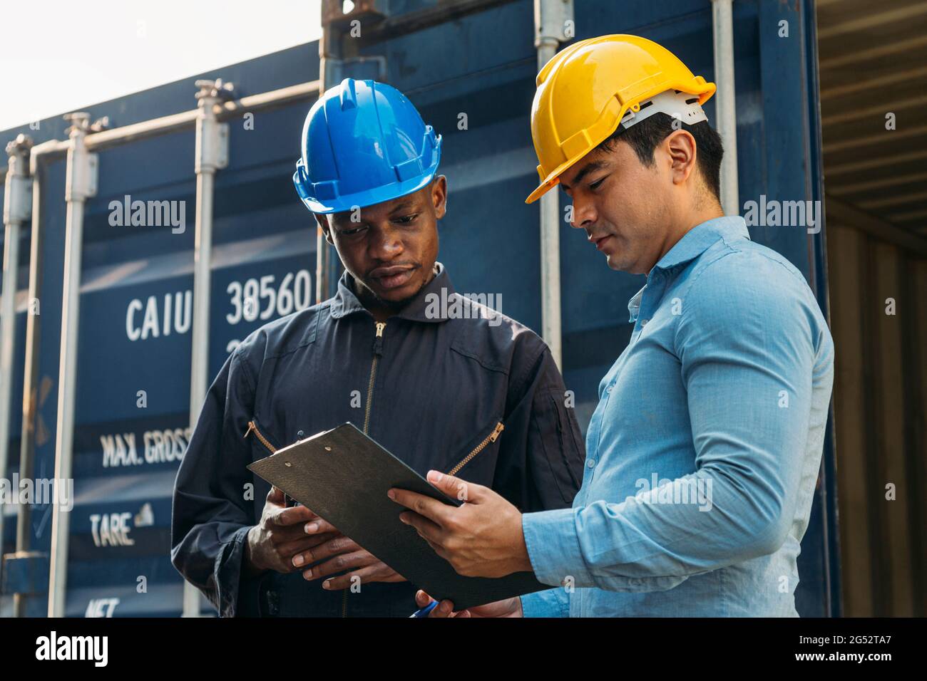 professional engineer and businessman checking and inspect containers ...