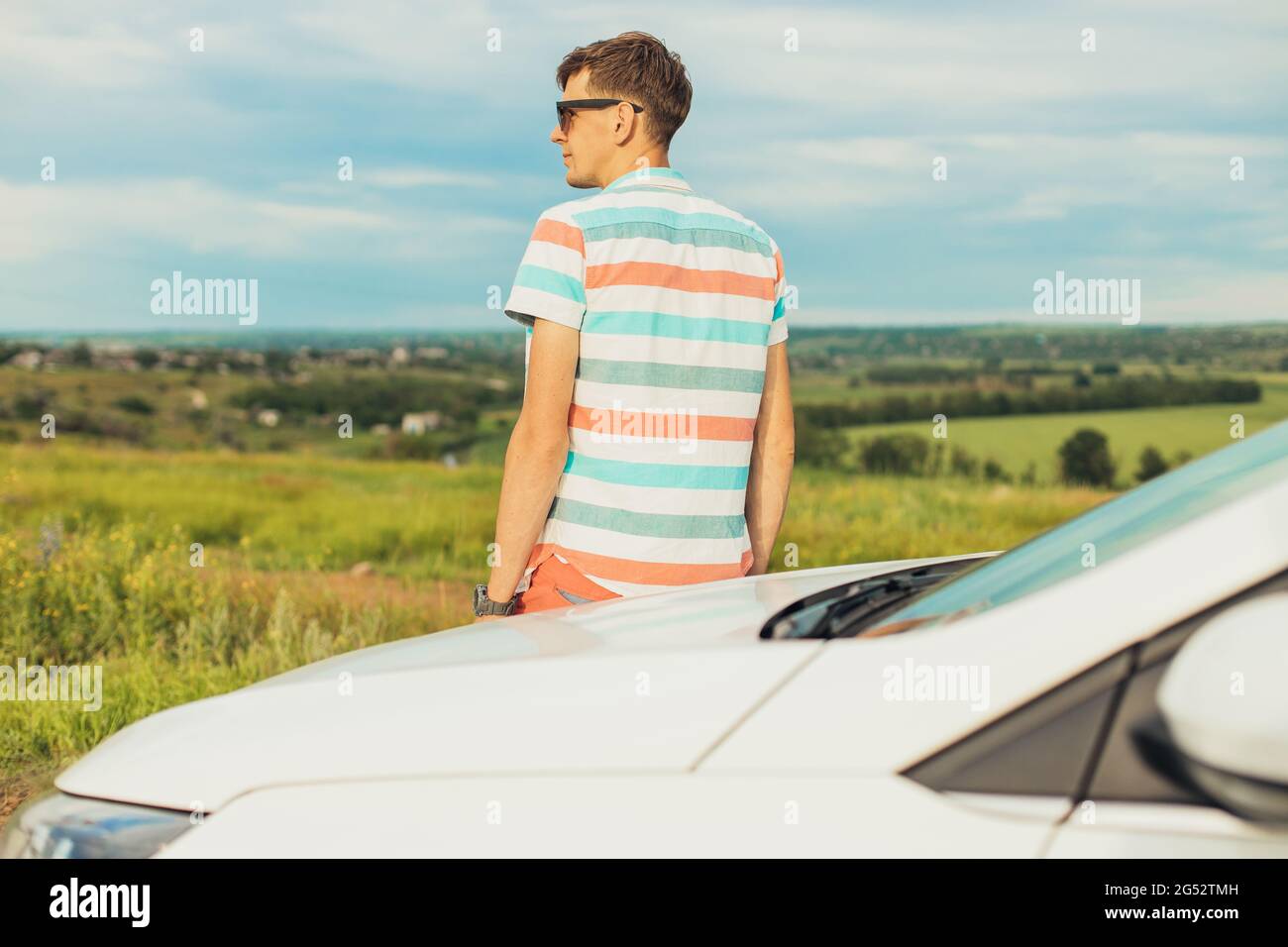 Man standing near the car hi-res stock photography and images - Alamy
