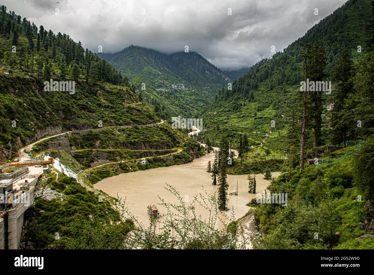 landscape view of himalyan mountains and green tree from kasol Stock ...
