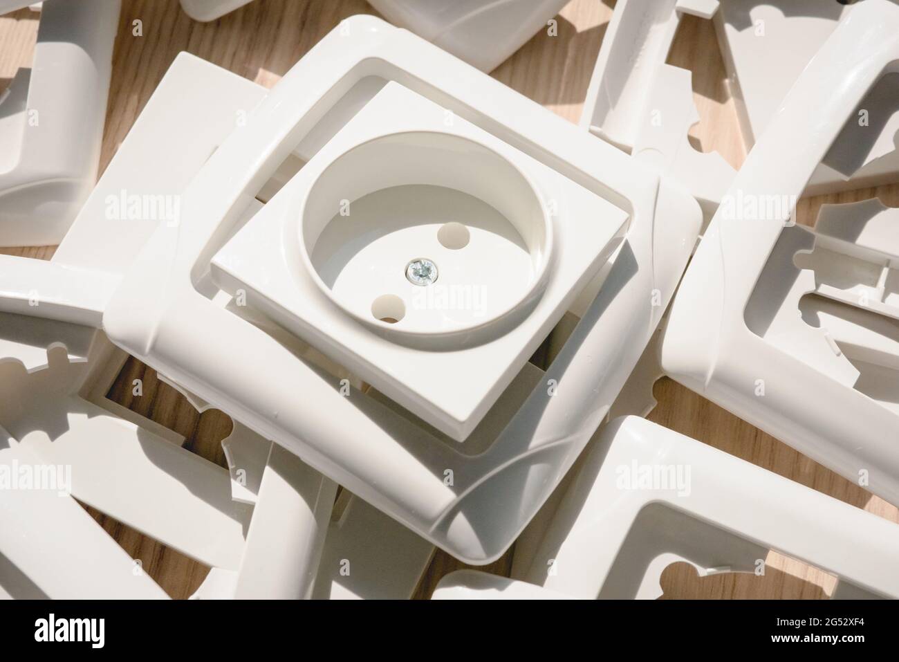 European power socket and the stack of socket frames Stock Photo - Alamy