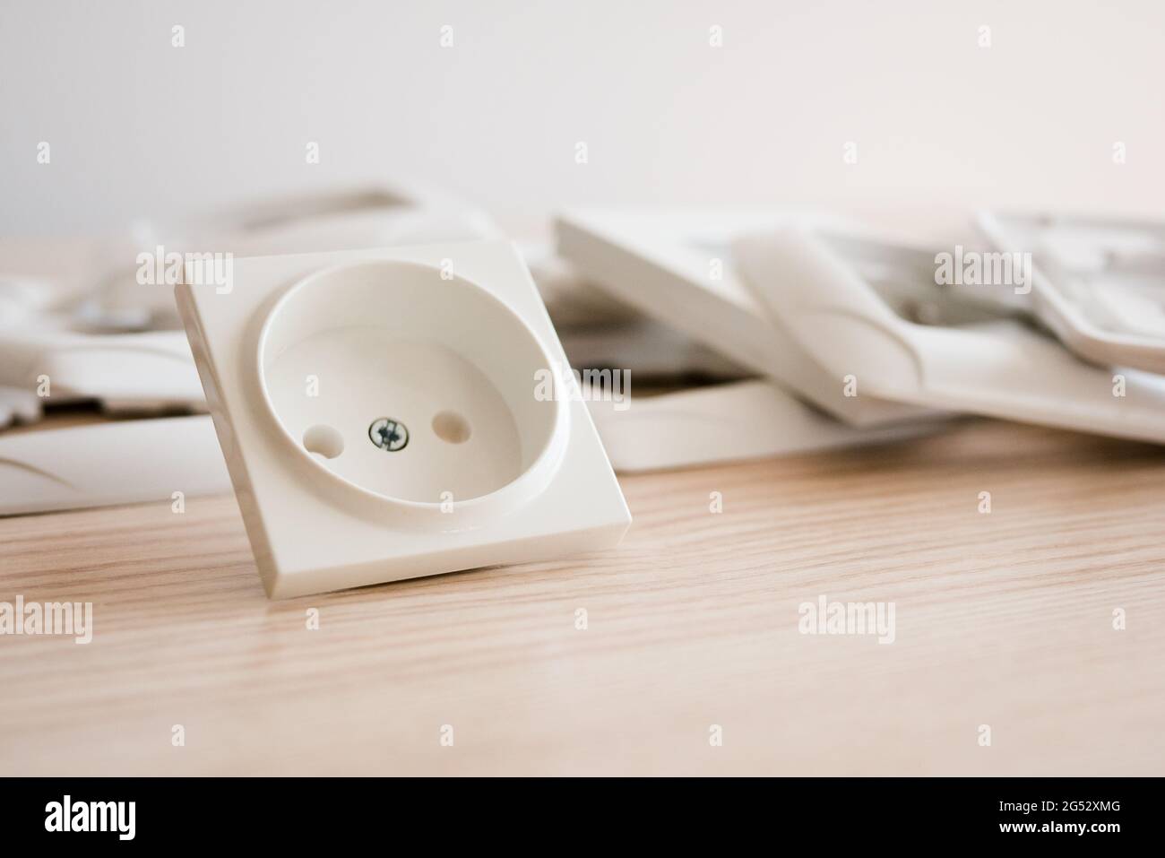 European power socket and the stack of socket frames Stock Photo - Alamy