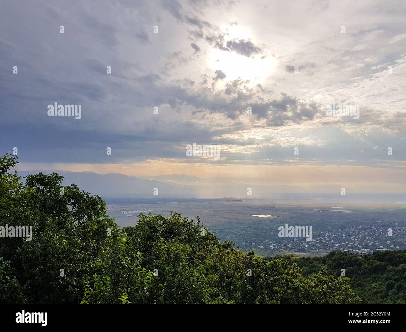 The rays of the sun over divine valley after the rain Stock Photo - Alamy