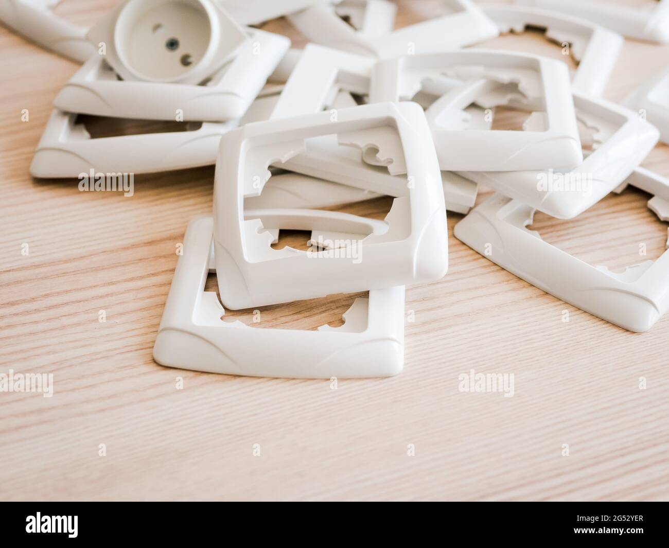 European power socket and the stack of socket frames Stock Photo - Alamy