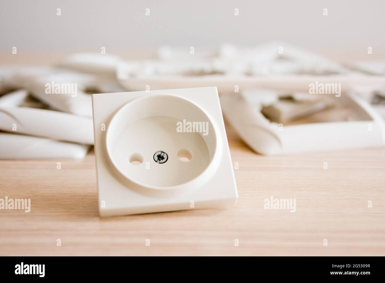 European power socket and the stack of socket frames Stock Photo - Alamy