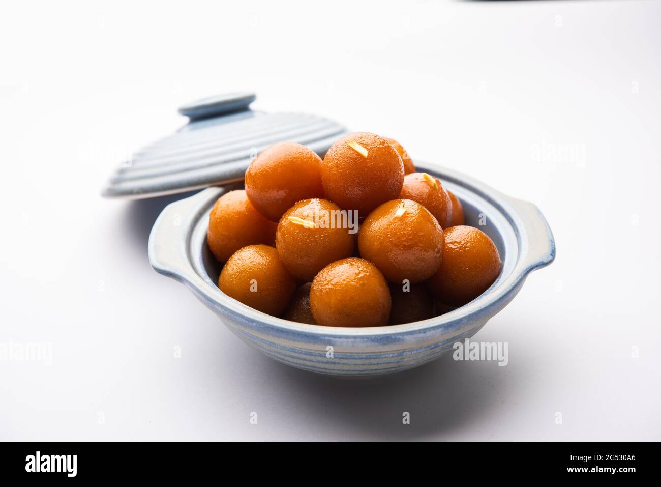 Gulab jamun is a milk-solid-based sweet dumpling popular in India ...