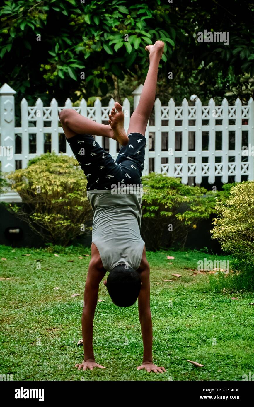 A boy jumping dance on ground Stock Photo - Alamy